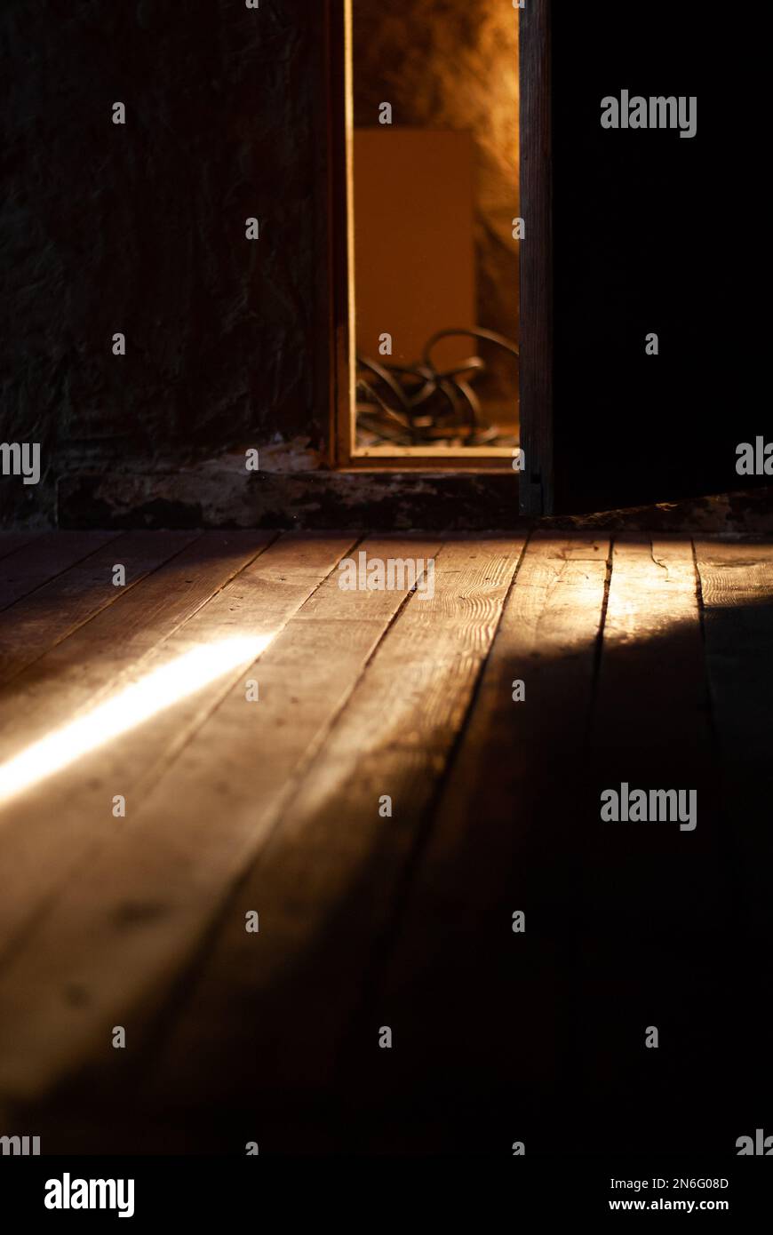 Room with sunlight from door Stock Photo - Alamy