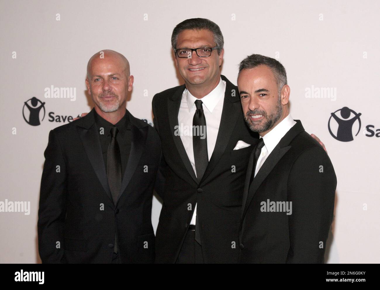 From left, fashion designer Italo Zucchelli, PVH Corporation Chairman ...