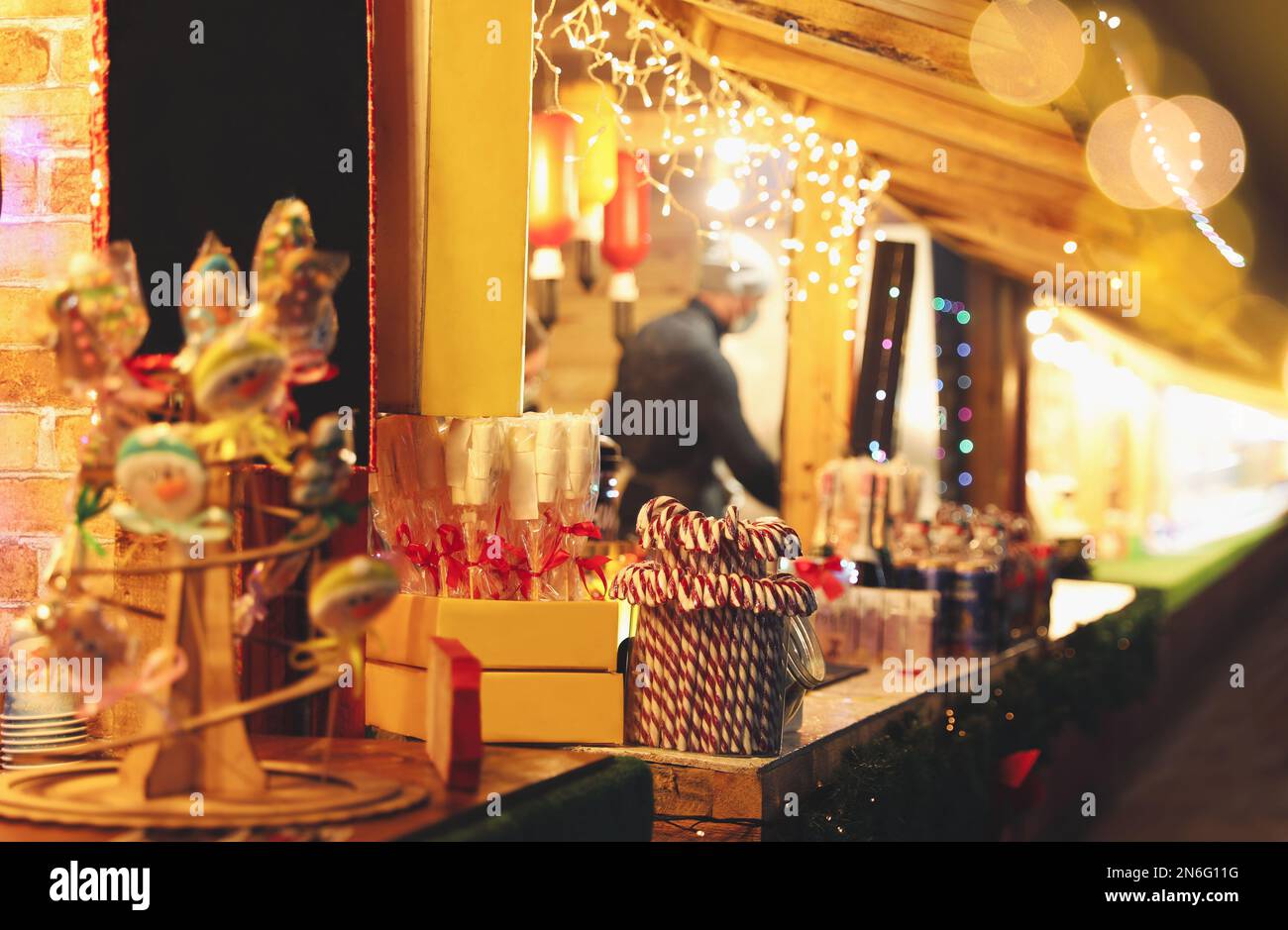 Decorated Christmas fair stall with different treats Stock Photo - Alamy