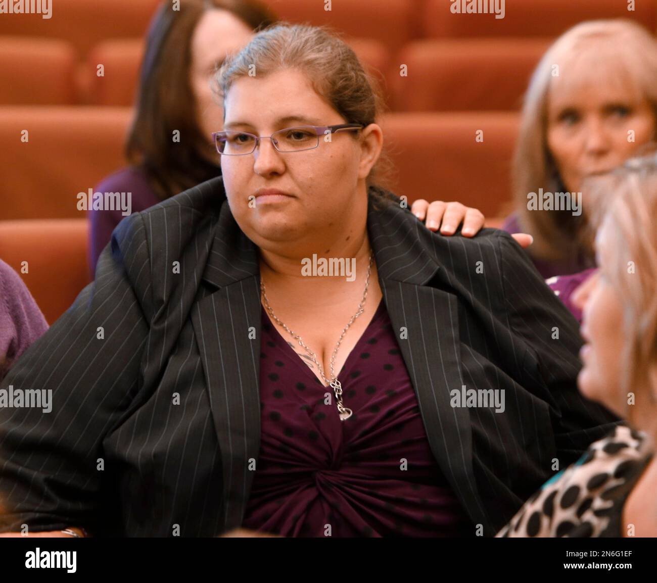 Sarah Ridgeway, the mother of 10-year-old Jessica Ridgeway is comforted ...