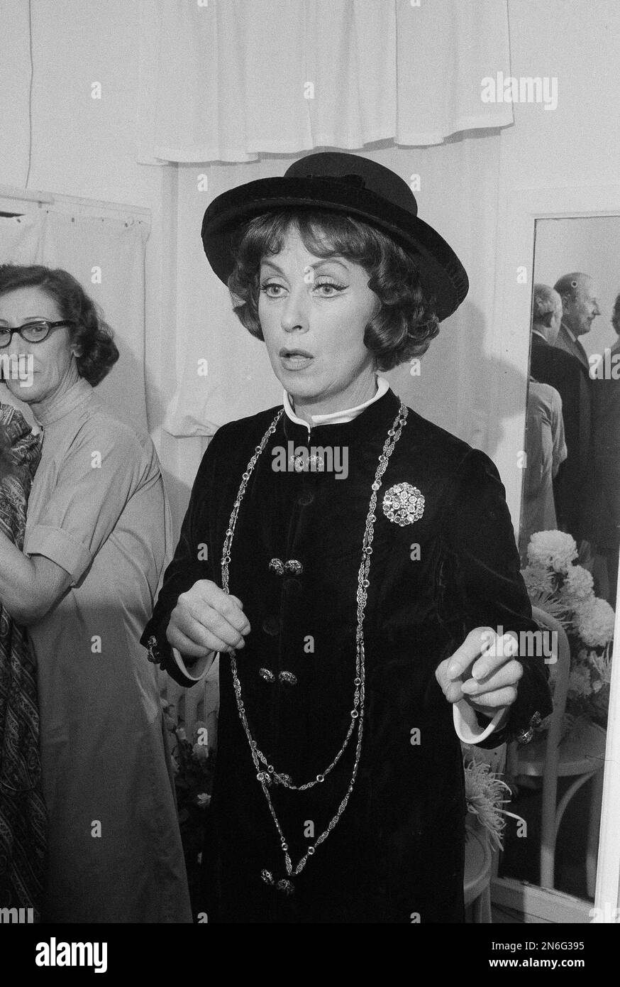 Danielle Darrieux is shown backstage in her dressing room at the Mark ...