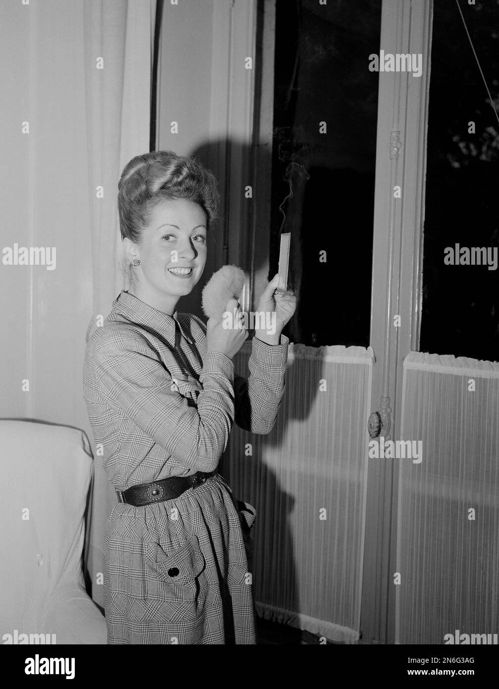 French film star Danielle Darrieux is pictured in her Paris apartment ...