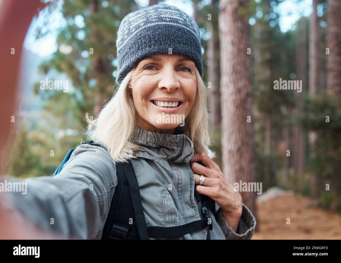 Sharing my alone time with my followers. a mature woman taking a selfie ...