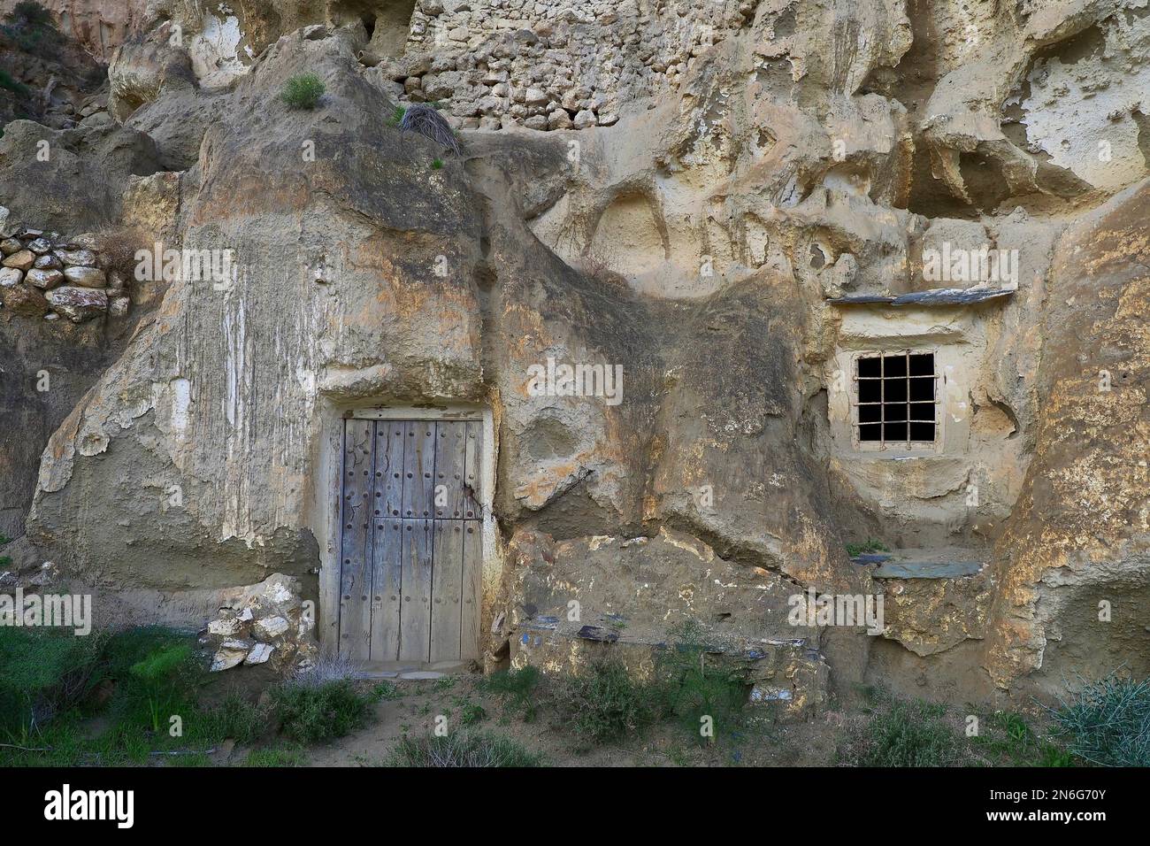 Entrance to a cave dwelling at Cuevas del Almanzora, wooden door of a ...