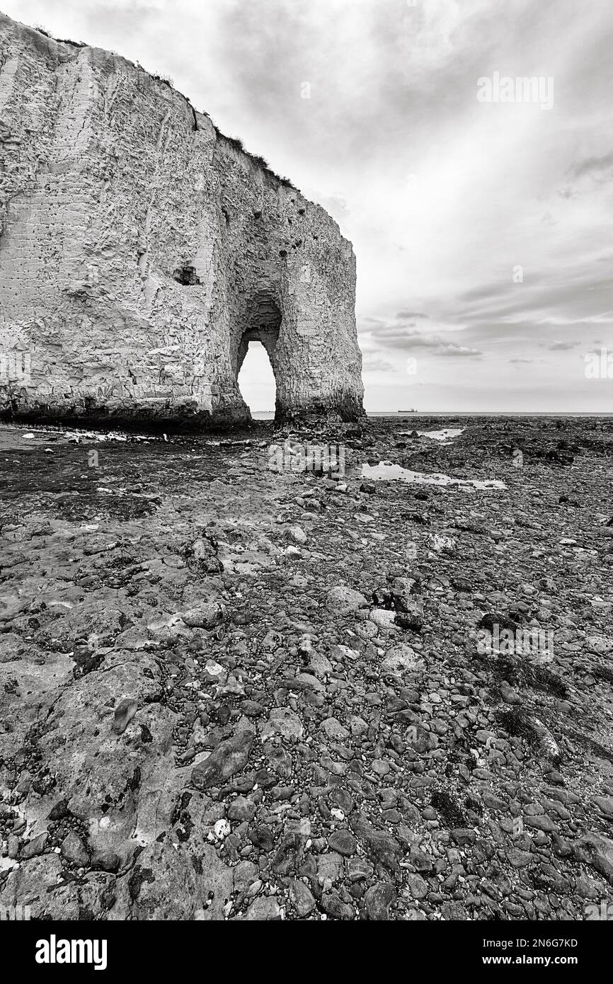 Chalk cliffs, cliff with natural arch at low tide, Kingsgate Bay ...