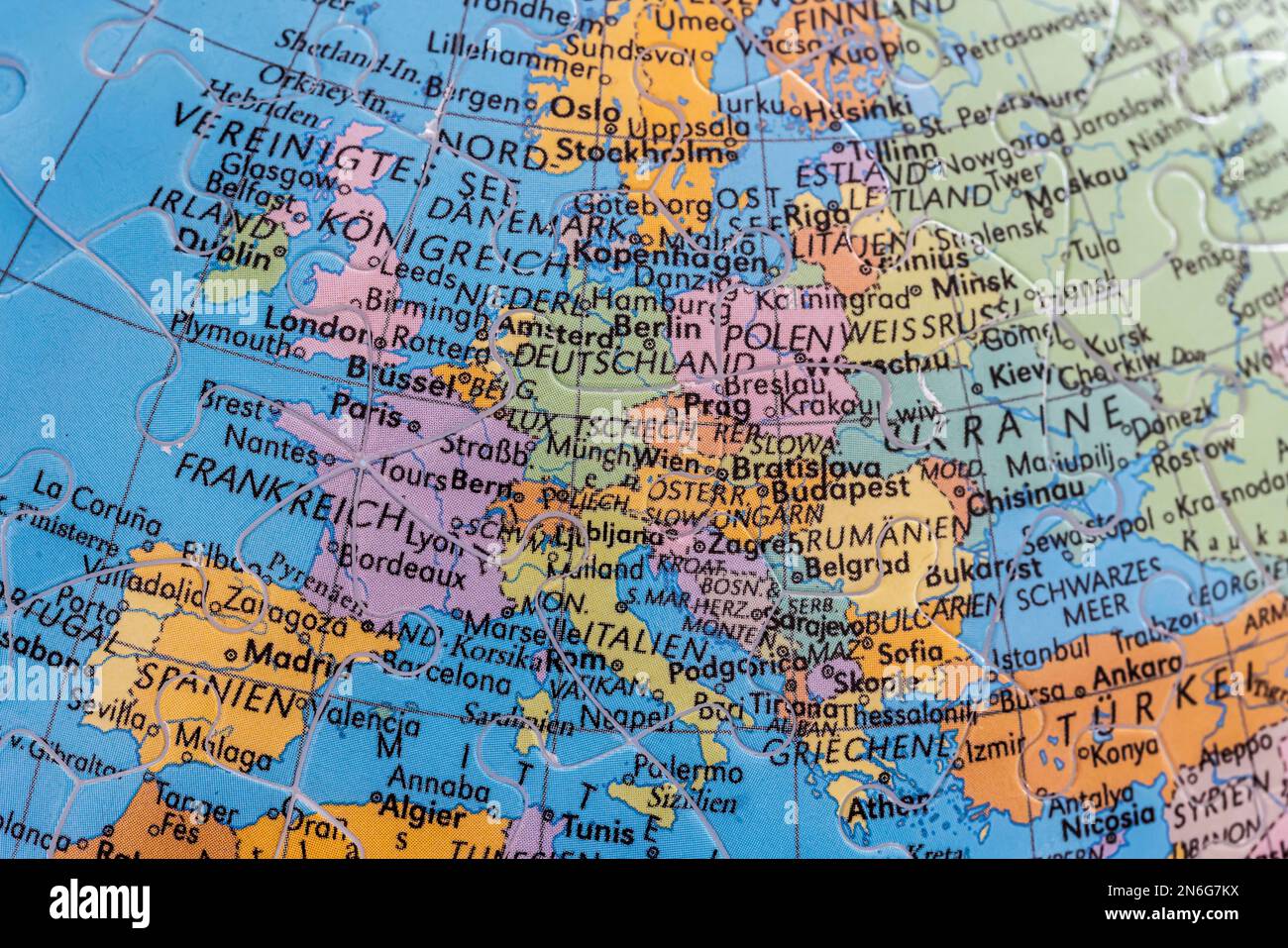 Globe made of puzzle pieces with a view of the continent of Europe ...