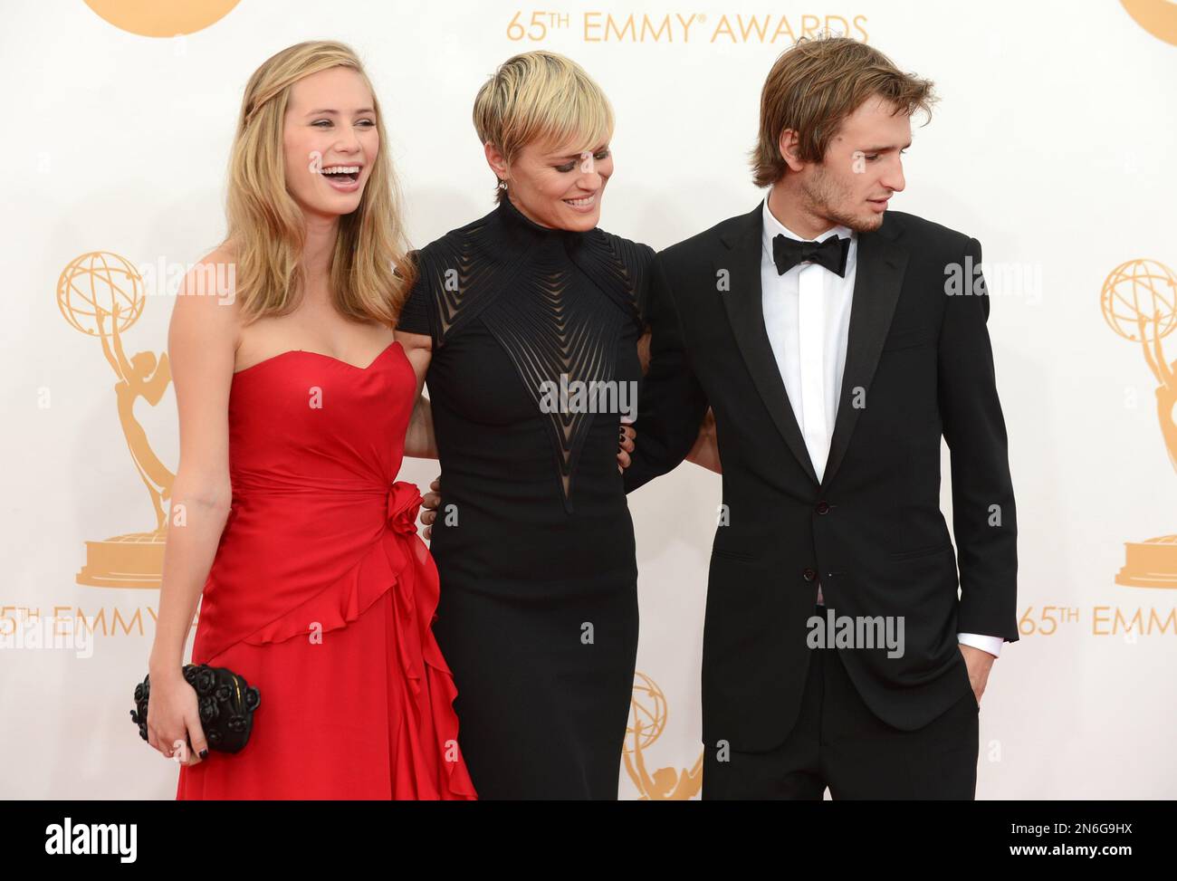From left, Dylan Penn, Robin Wright and Hopper Penn arrive at the 65th ...