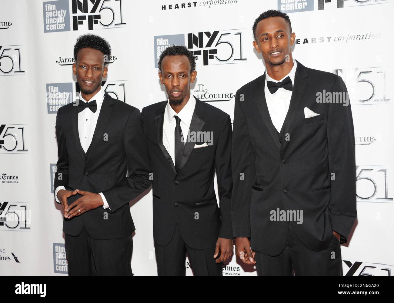 Somali actors Mahat M. Ali, left, Barkhad Abdi and Faysal Ahmed attend ...