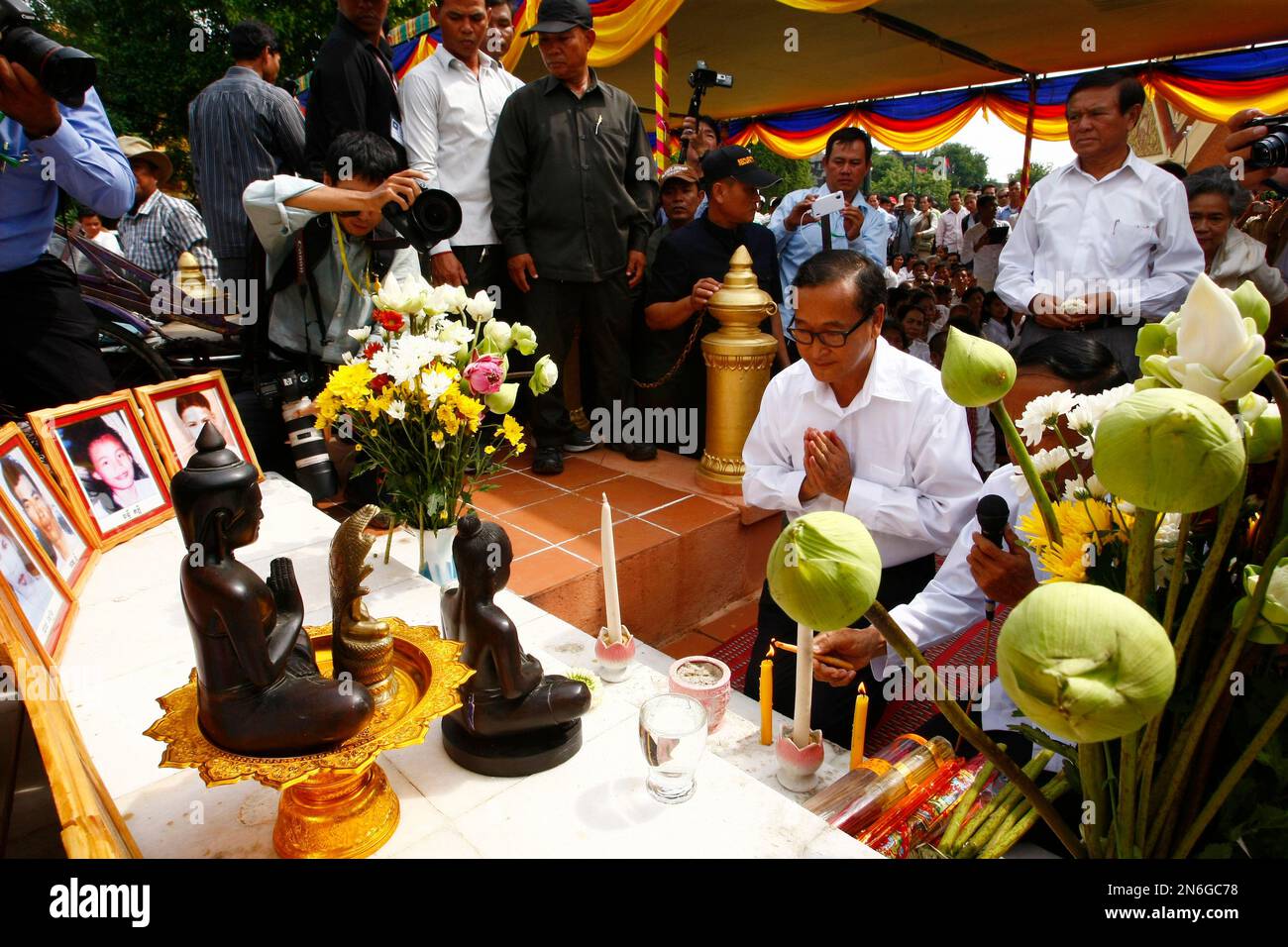 Opposition Cambodia National Rescue Party President Sam Rainsy prays in ...
