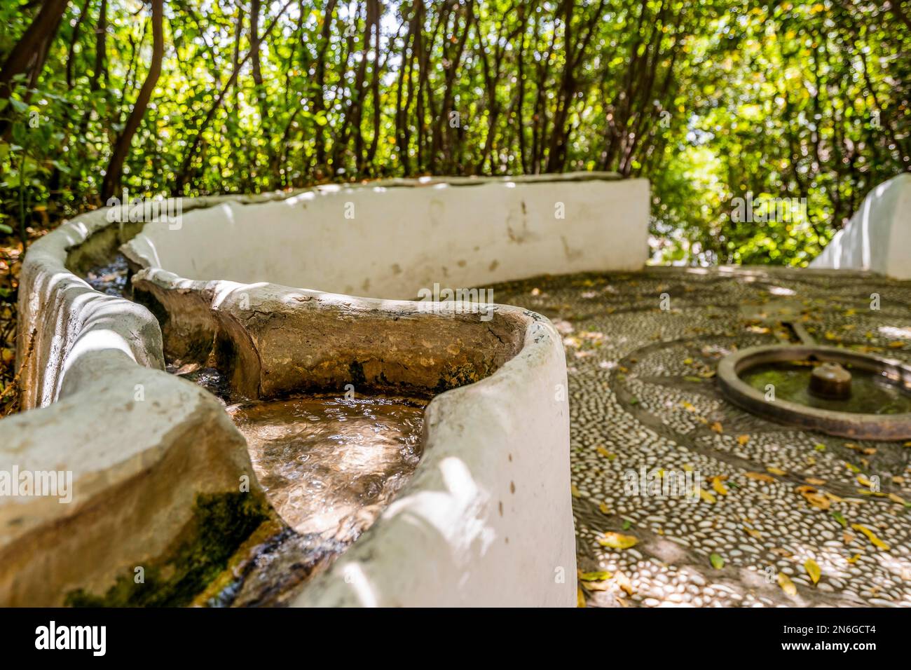 Water flowing in the handrail in Generalife garden in palace complex ...