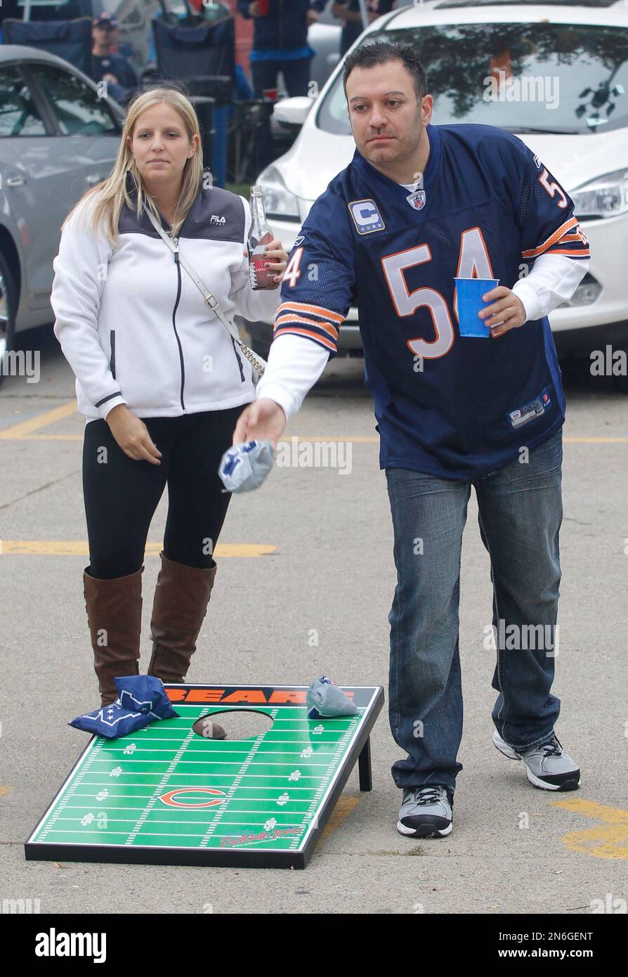 Fareed Saba, right, plays bag toss against Jodie Parsons, both of Lake ...