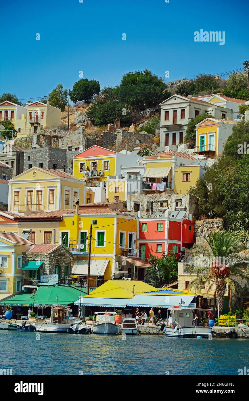 View of the colourful houses of Symi, Symi Island, Greece Stock Photo ...