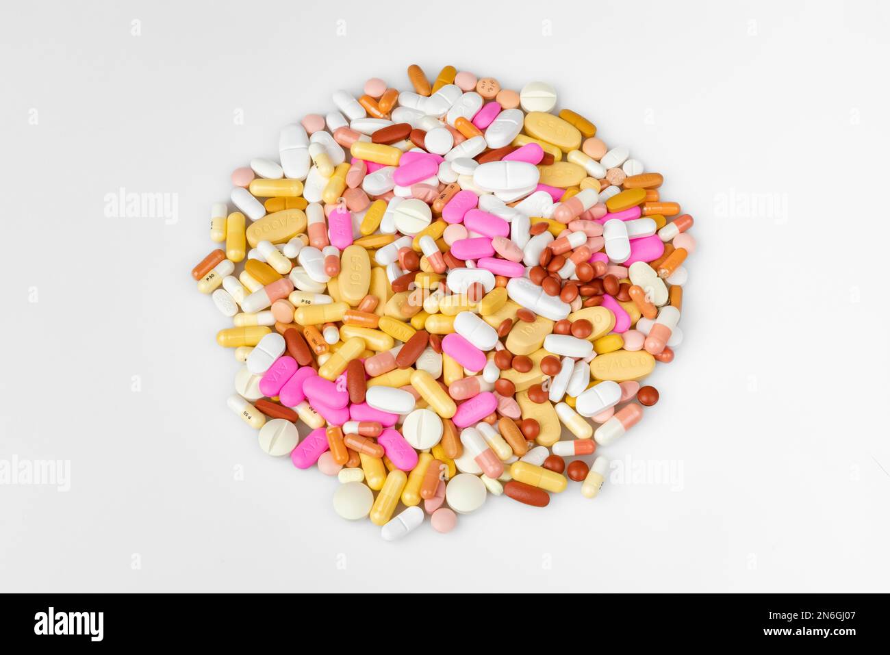 Colourful medical pills and capsules, without packaging, white ...