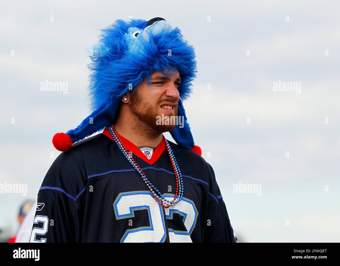 Buffalo Bills fan Chad Rose of West Winfield, N.Y., walks in a parking ...