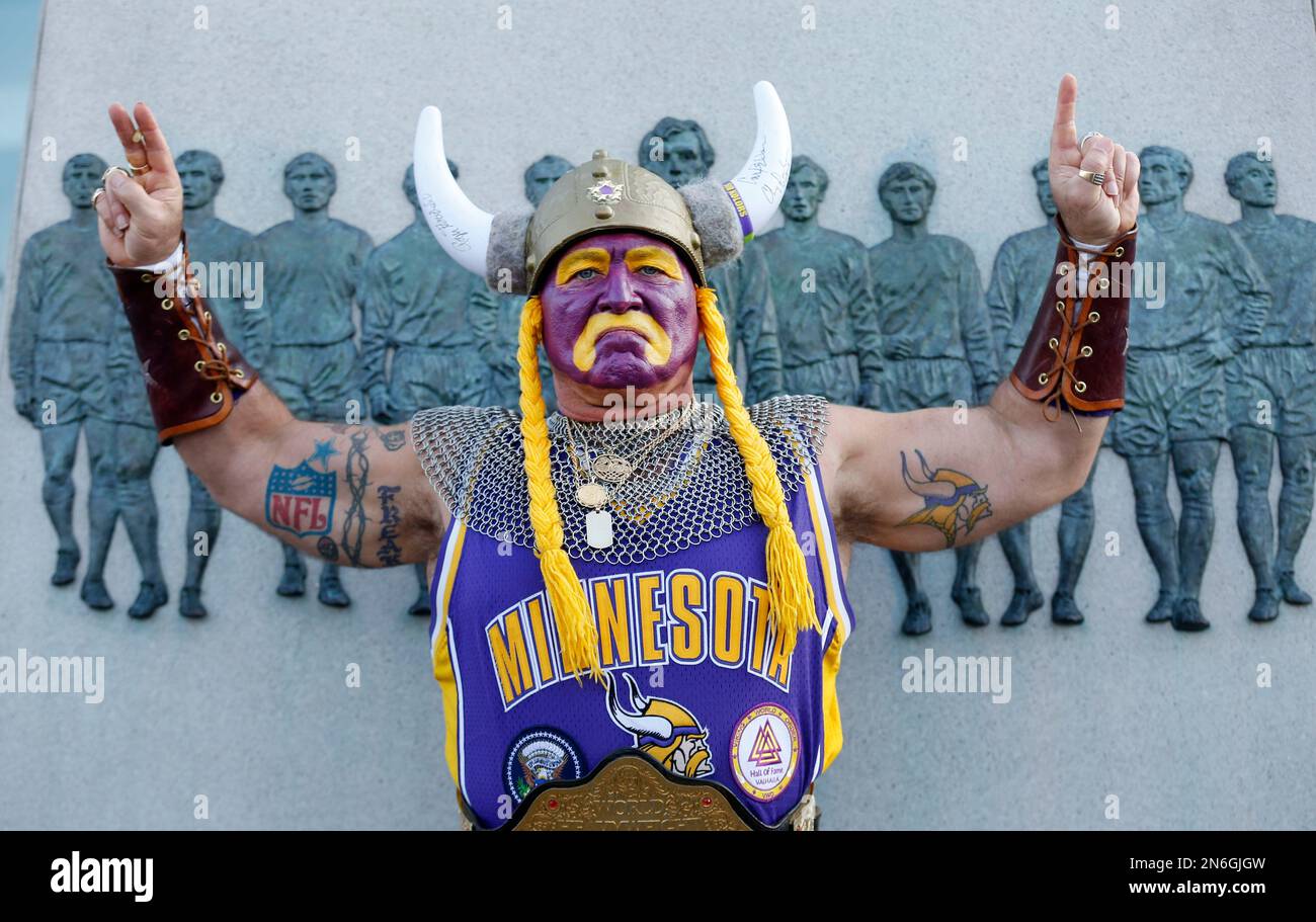 Vikings supporter Syd Davy poses for a photograph in front of the ...