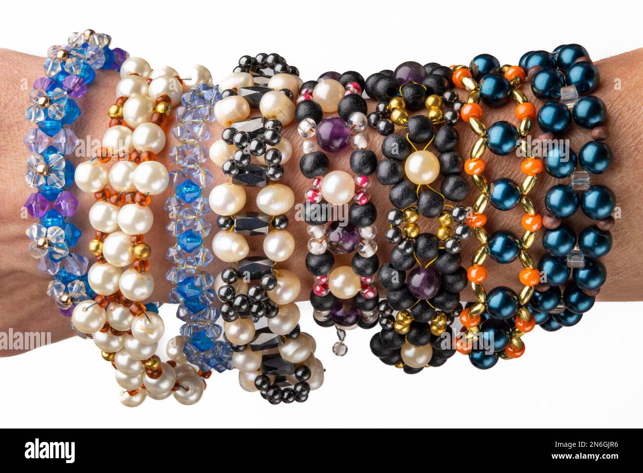 Female forearm, handmade bracelets, colourful beads, costume jewellery ...