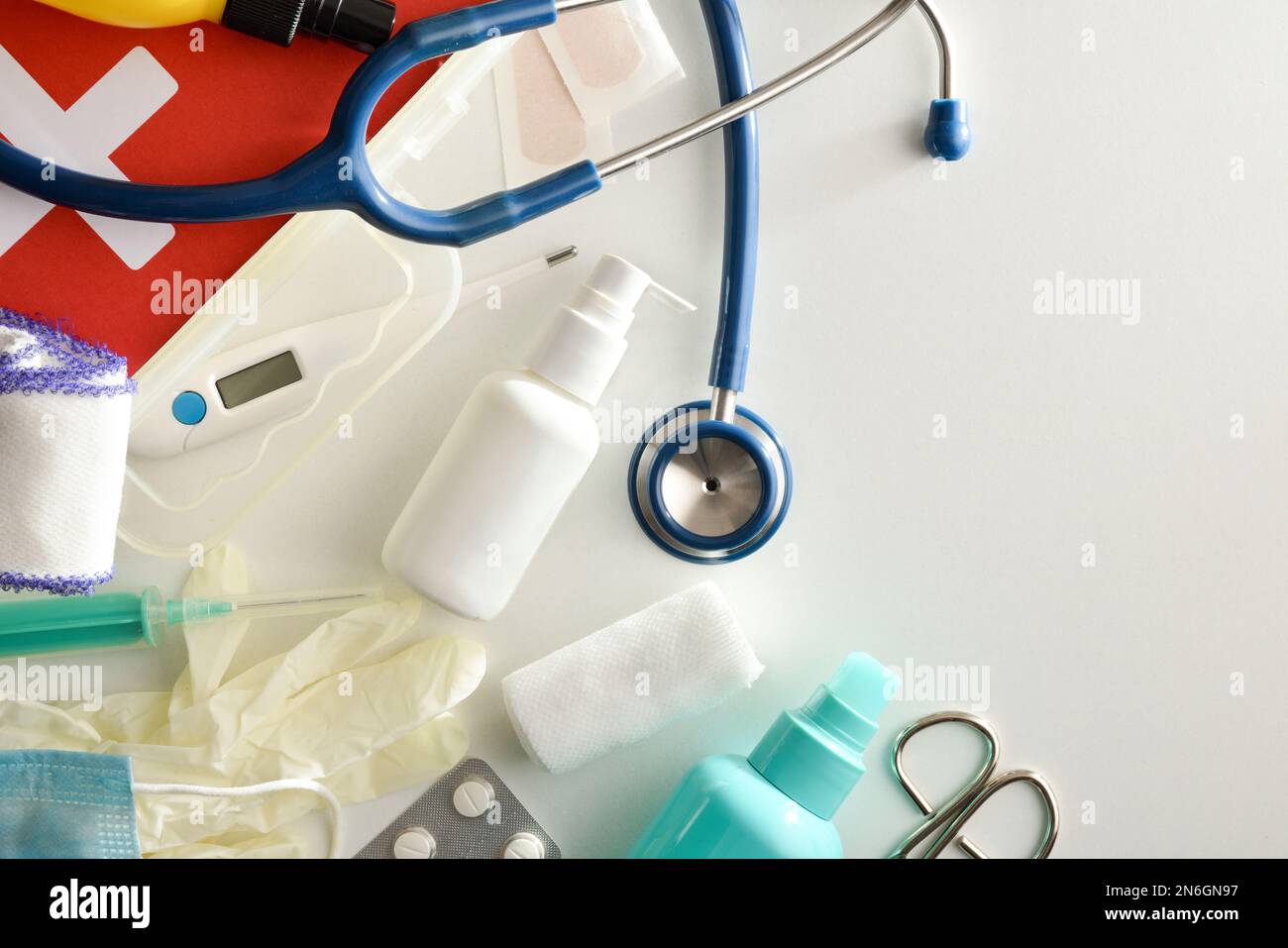 Assortment of basic first aid portable medical assistance equipment on ...