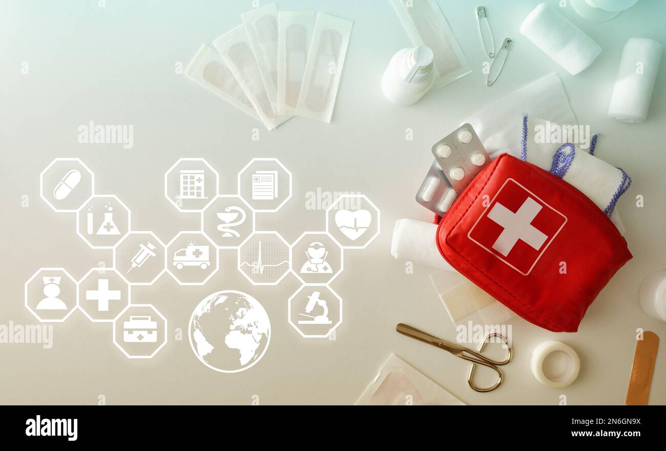 international aid healthcare medicine with first aid kit on table full ...