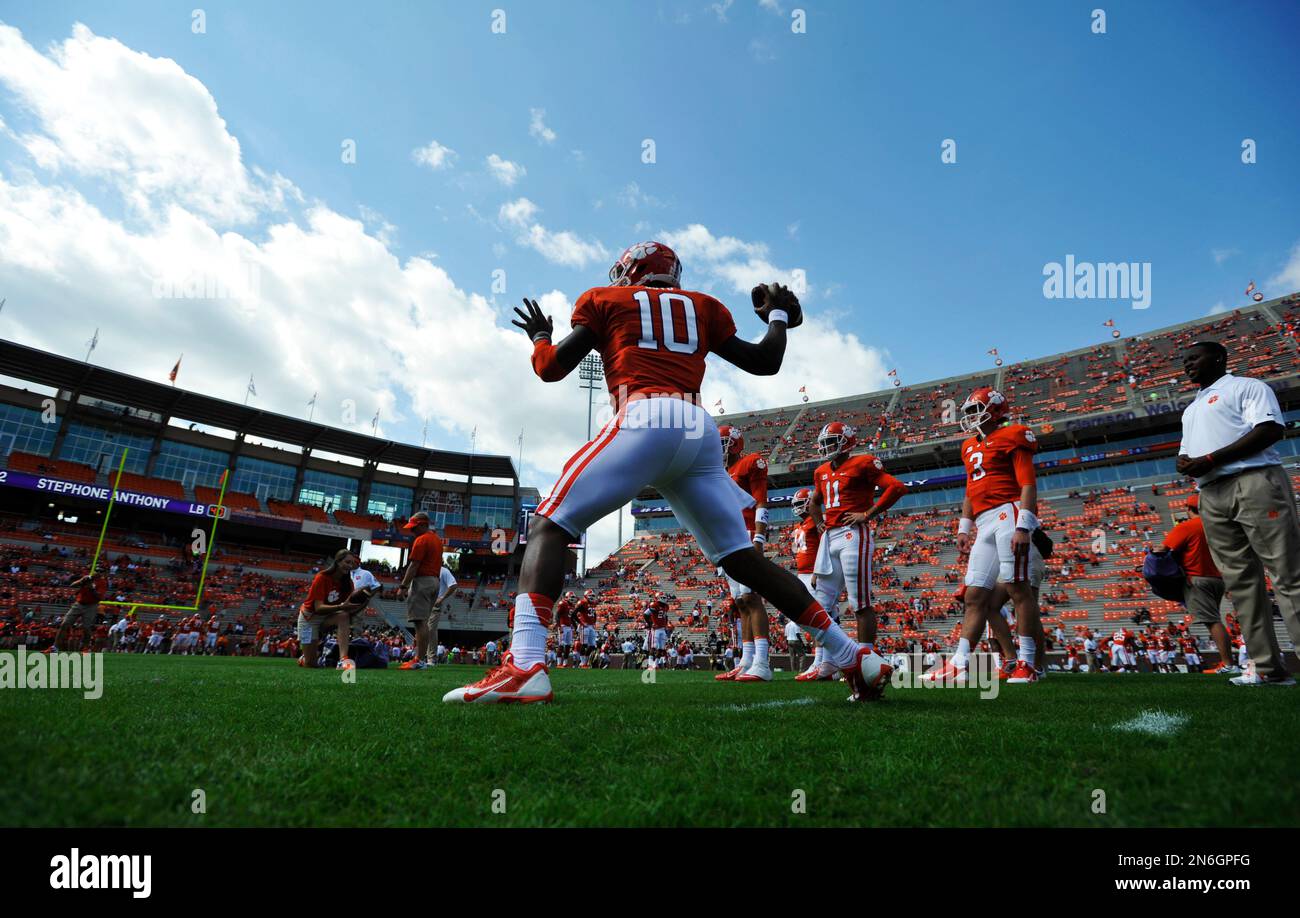 Clemson quarterback Tajh Boyd (10) throws as he warms up before an NCAA ...