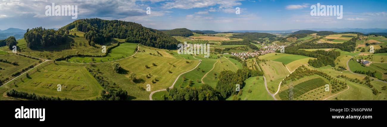View over cultivated landscape to the ruins of Farnsburg Castle, in the ...