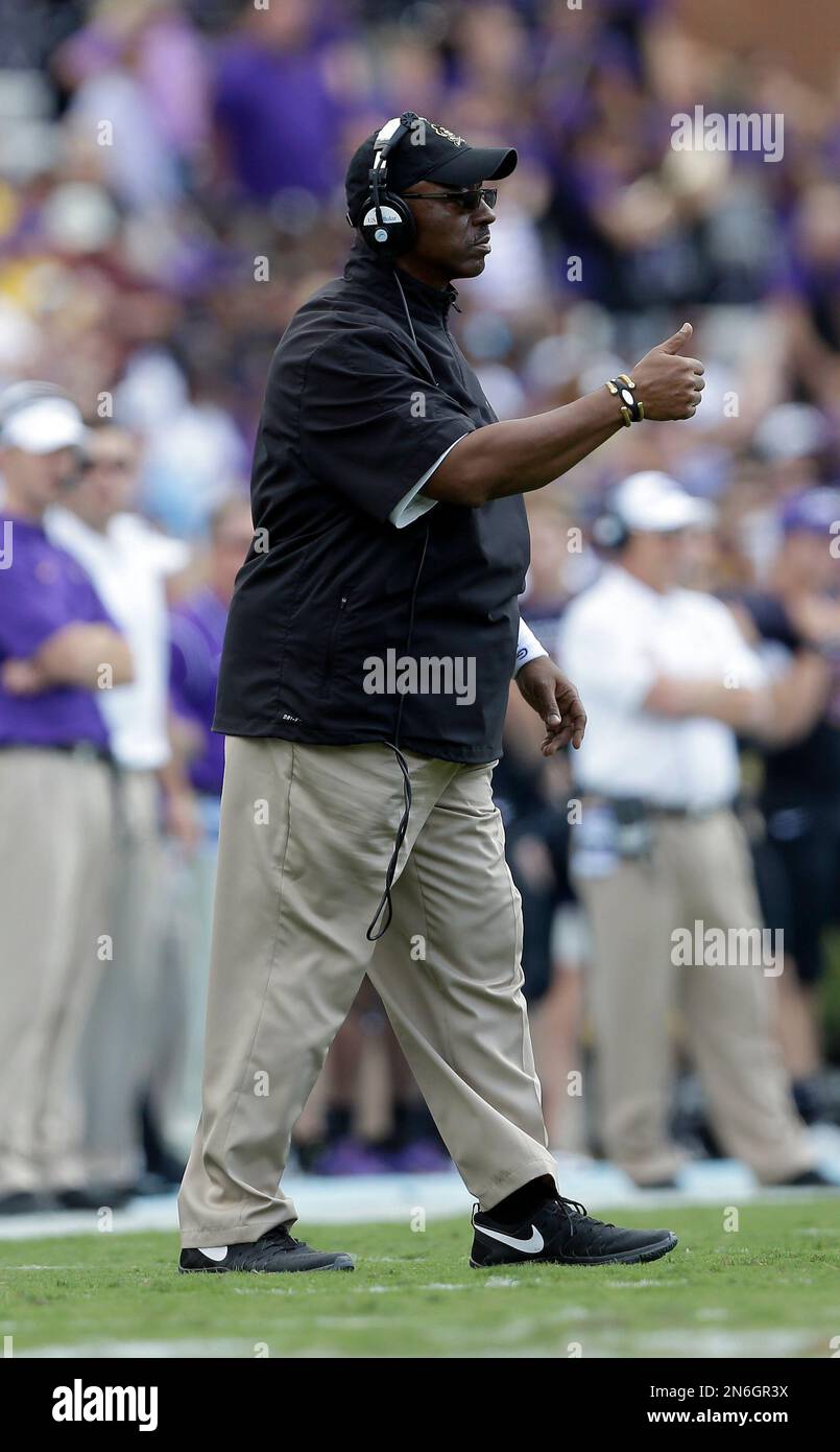 East Carolina coach Ruffin McNeill gives a thumbs-up during the first ...