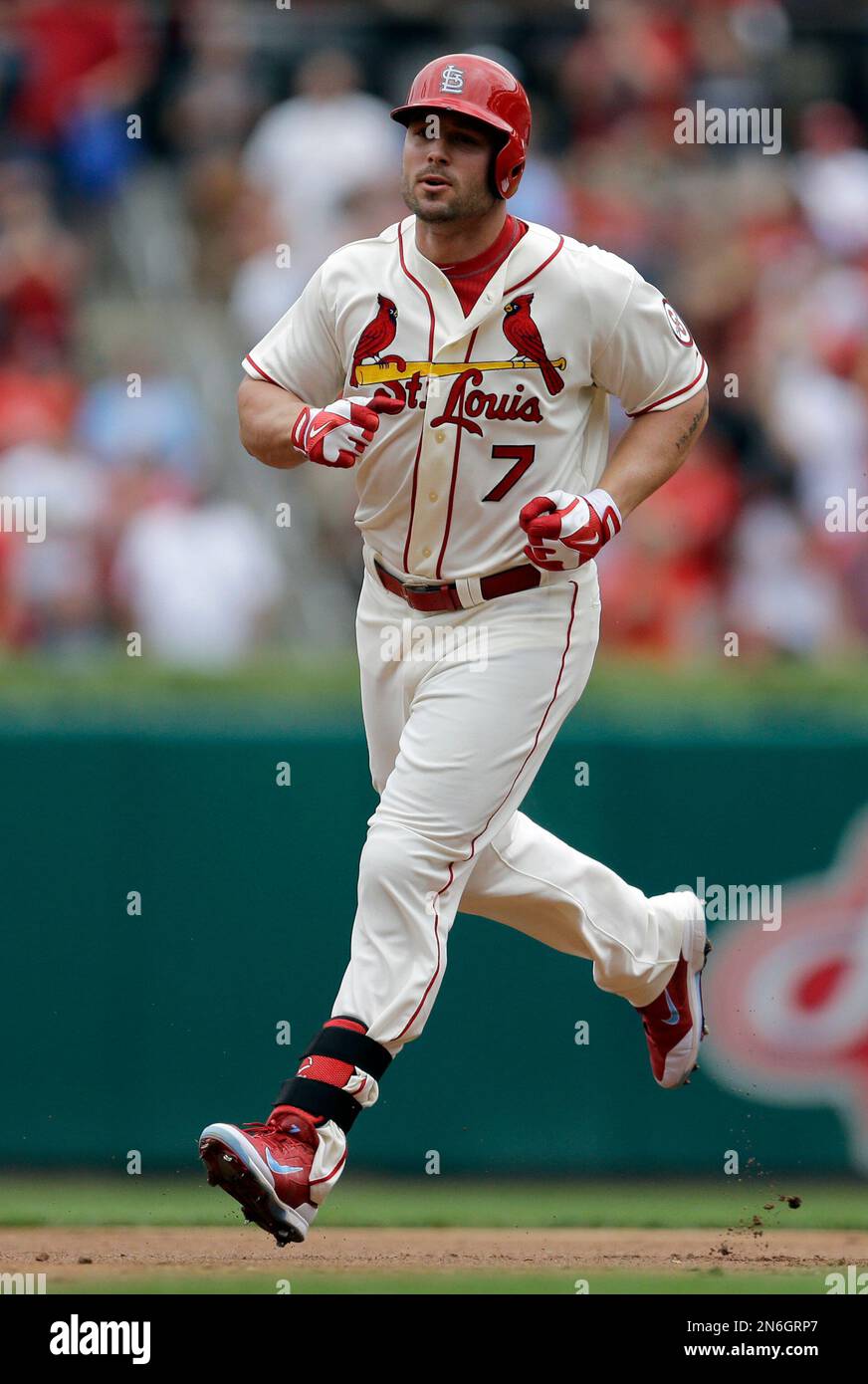 St. Louis Cardinals' Matt Holliday rounds the bases after hitting a two ...