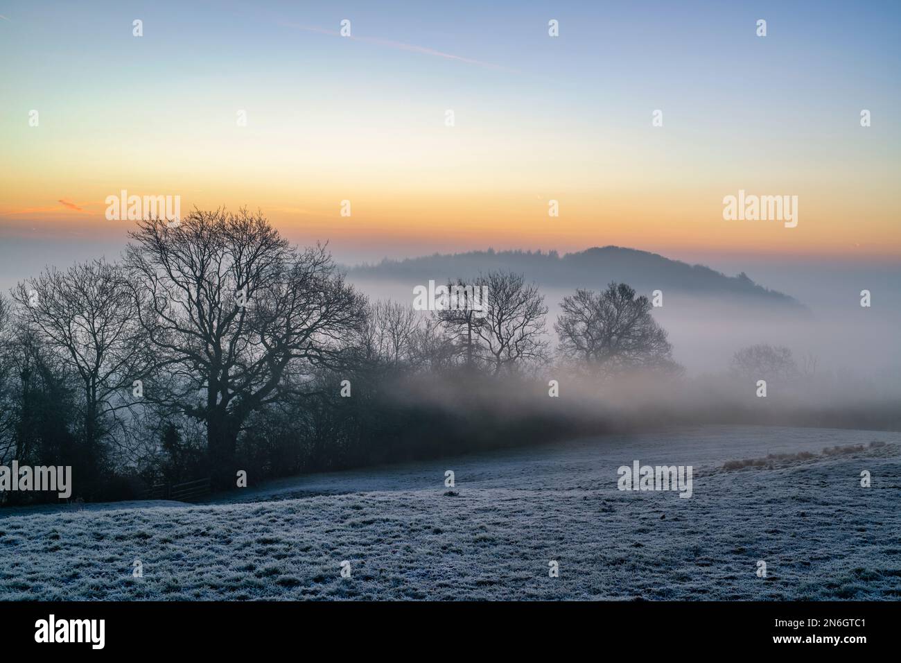 Early morning fog across the Oxfordshire countryside before sunrise ...