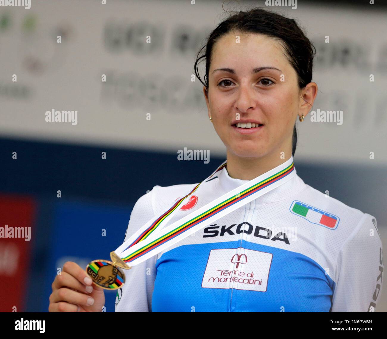 Italian cyclist Rossella Ratto shows the bronze medal she won in the ...