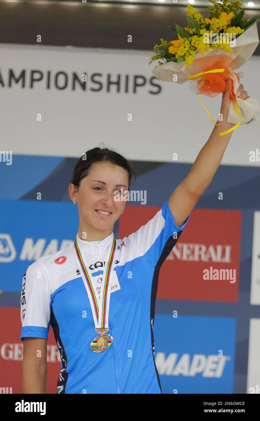 Italian cyclist Rossella Ratto celebrates with the bronze medal she won ...
