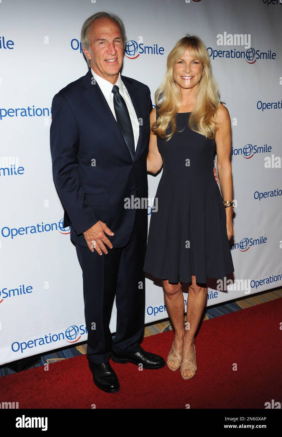 Dr. Randy Sherman, left, and Martha De Laurentiis arrive at Operation ...