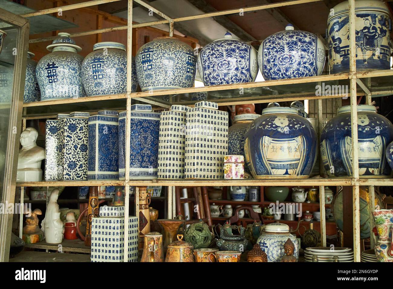 Vases on a shelf in antique shop, Shanghai, China Stock Photo - Alamy