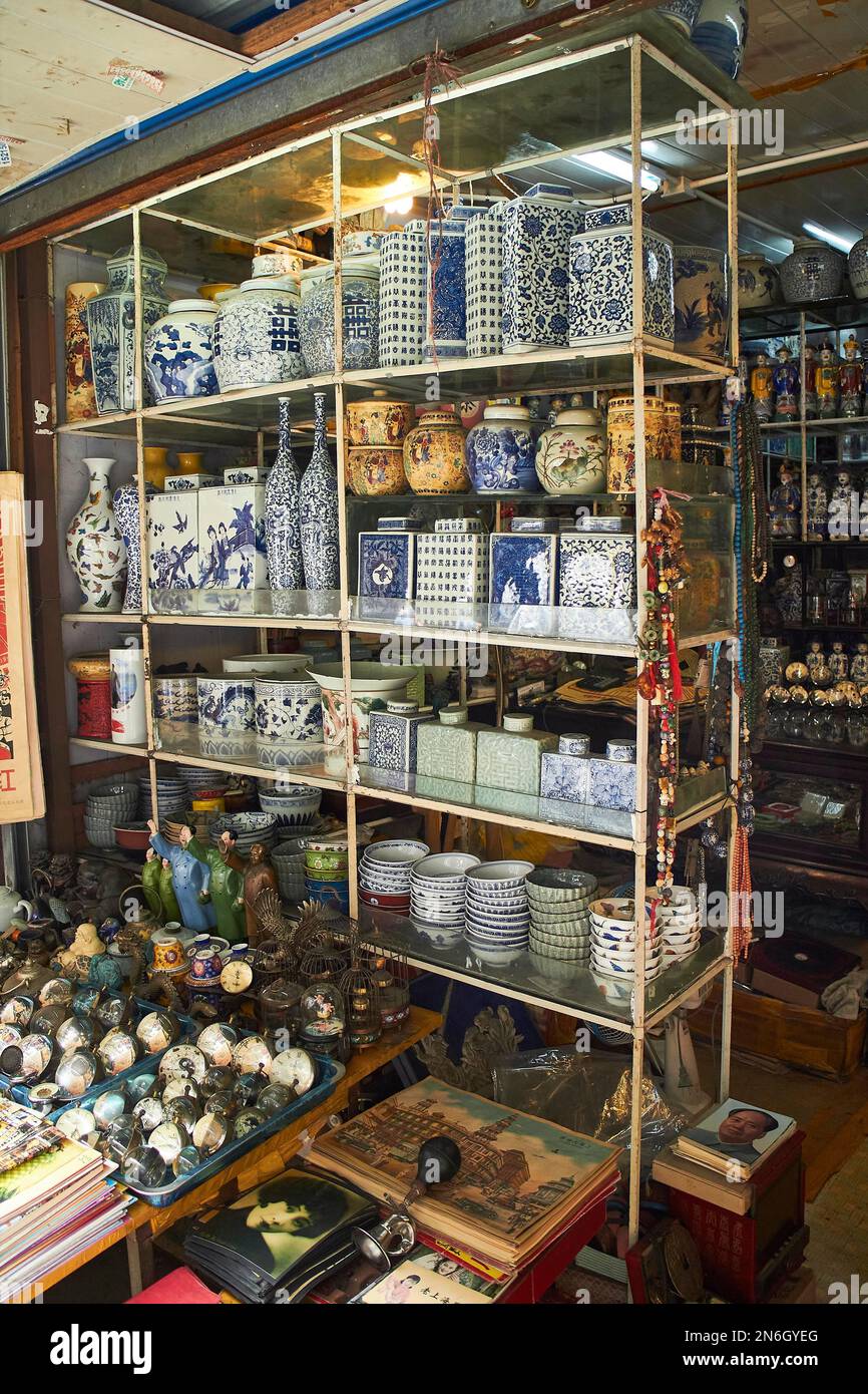Vases on a shelf in antique shop, Shanghai, China Stock Photo - Alamy