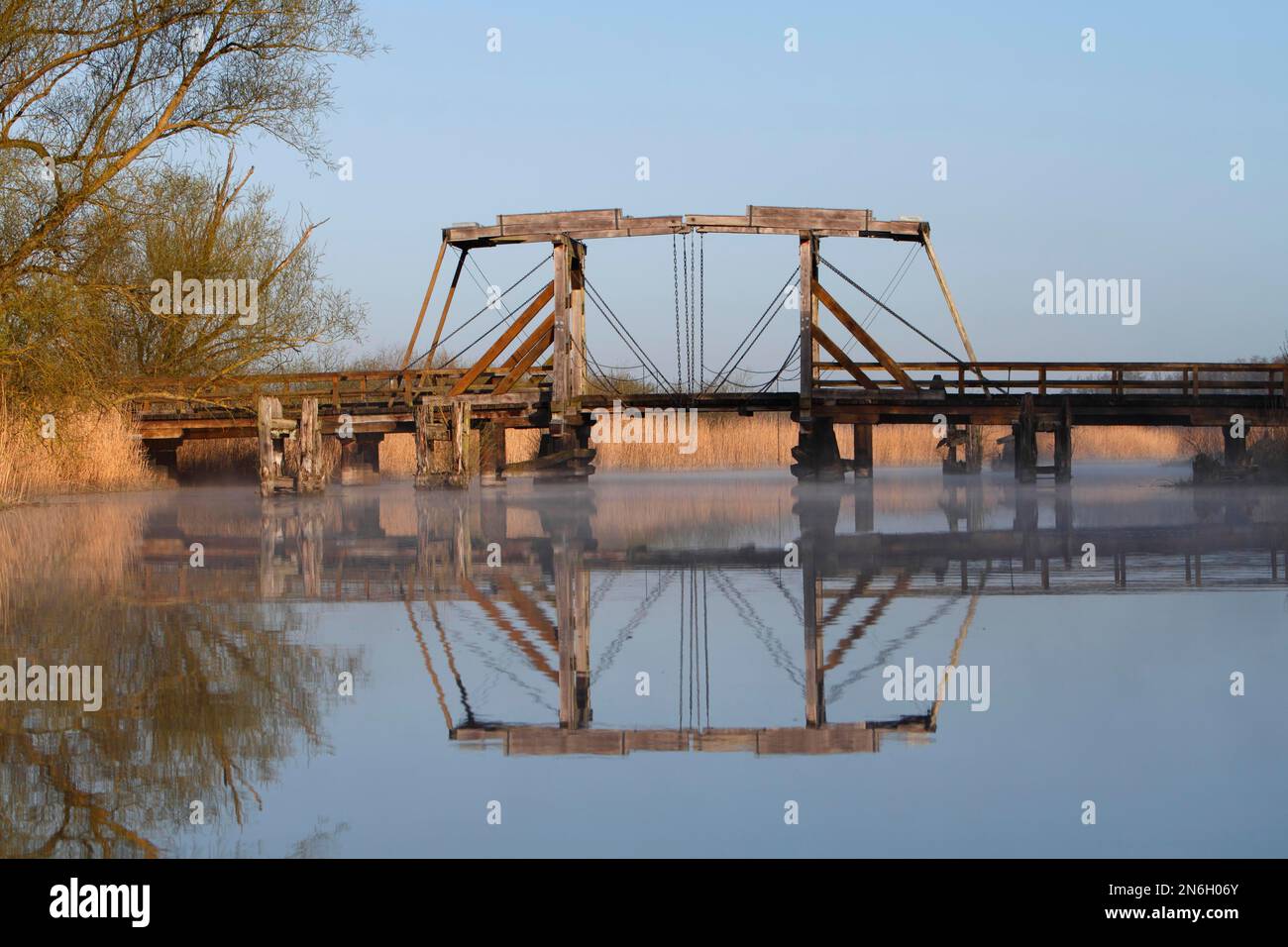 Historic wooden drawbridge over the Trebel near Nehringen, Peene Valley ...