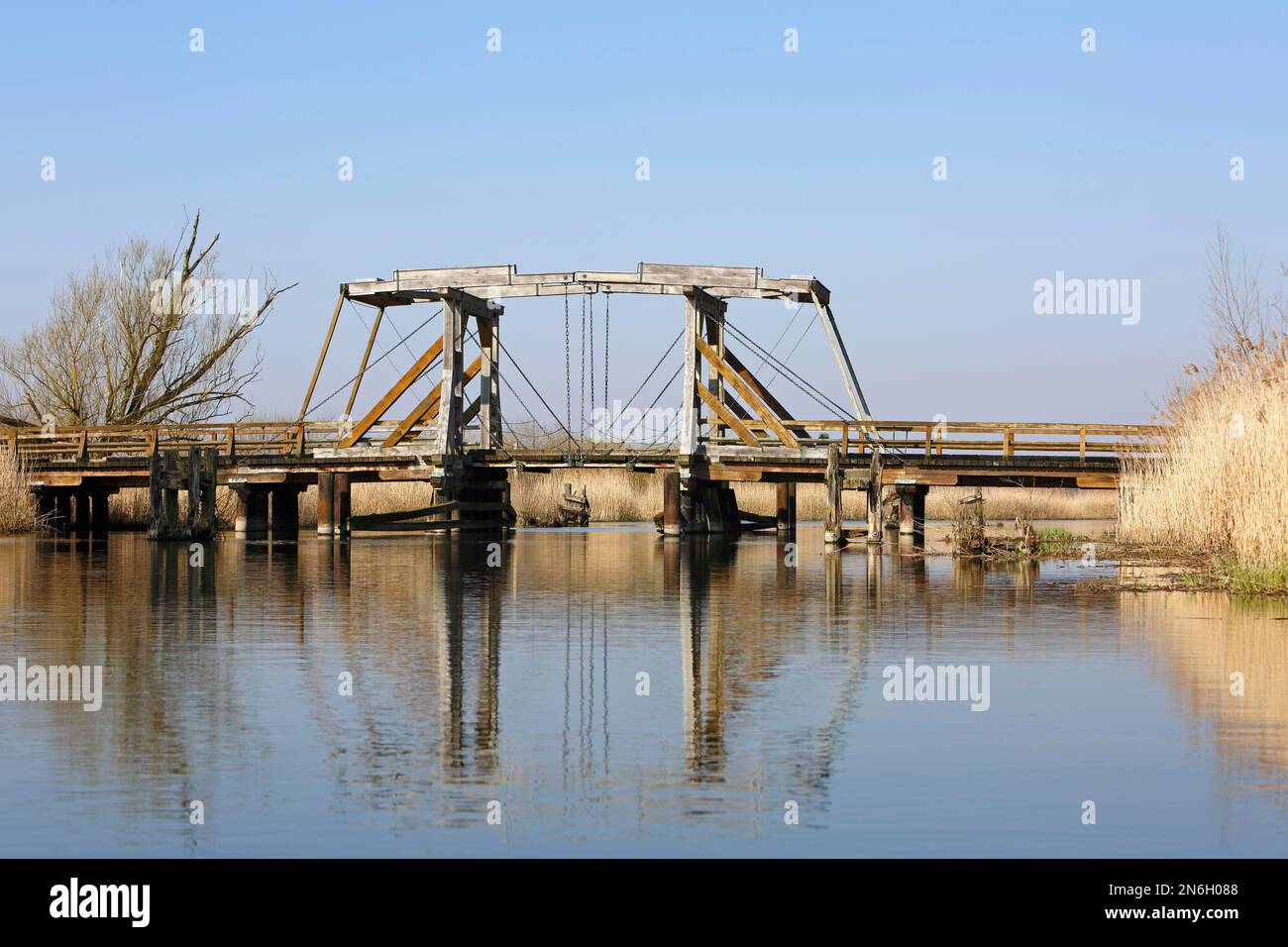 Historic wooden drawbridge over the Trebel near Nehringen, Peene Valley ...