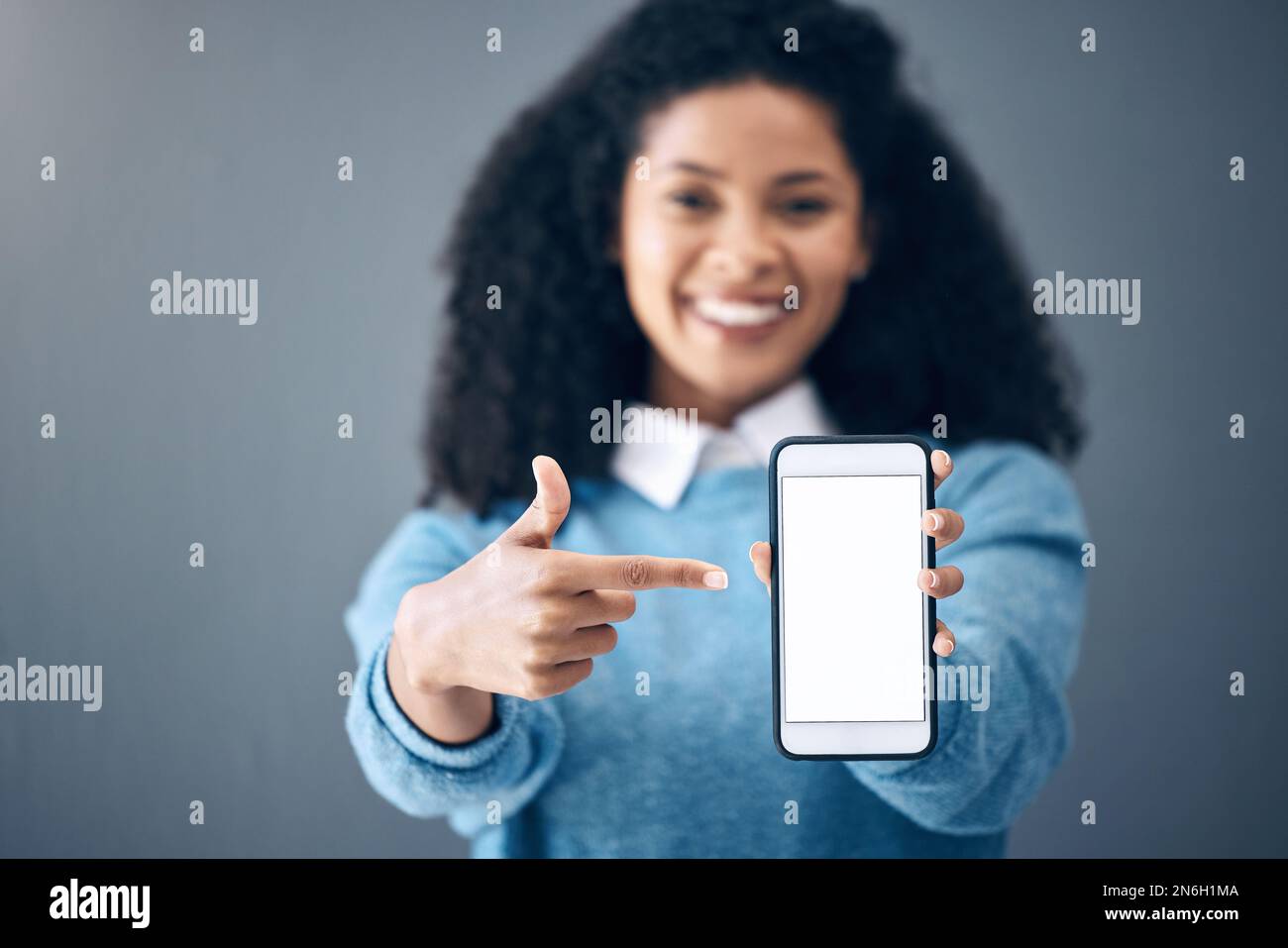 Mockup, phone screen or black woman pointing hand at digital marketing, branding or advertising ...