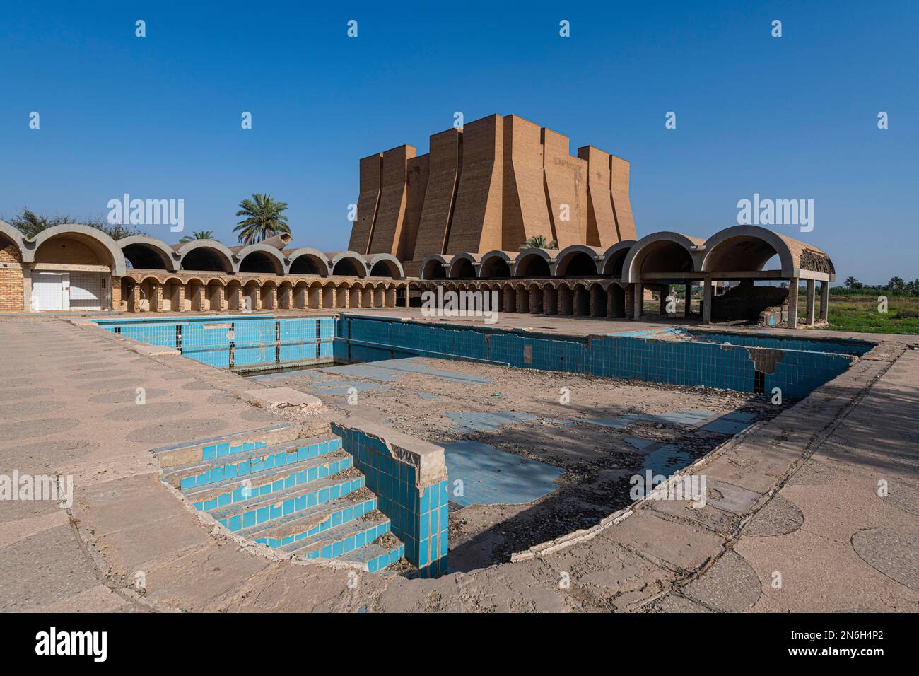 Abandonend swimming pool before the Panorama tower, Cetisphon, Iraq ...