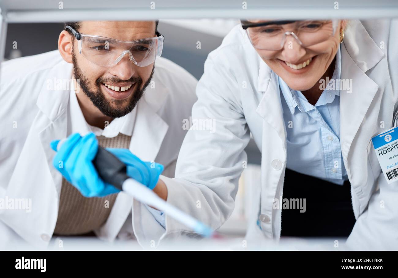 Scientist, lab and happy workers in a lab with dna sample work and data ...