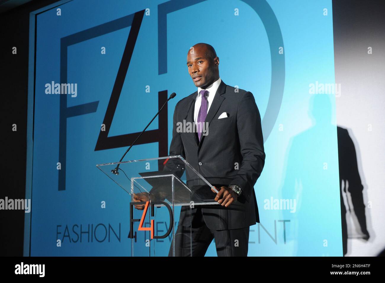 Model Chris Collins speaks at the Fashion 4 Development First Ladies ...