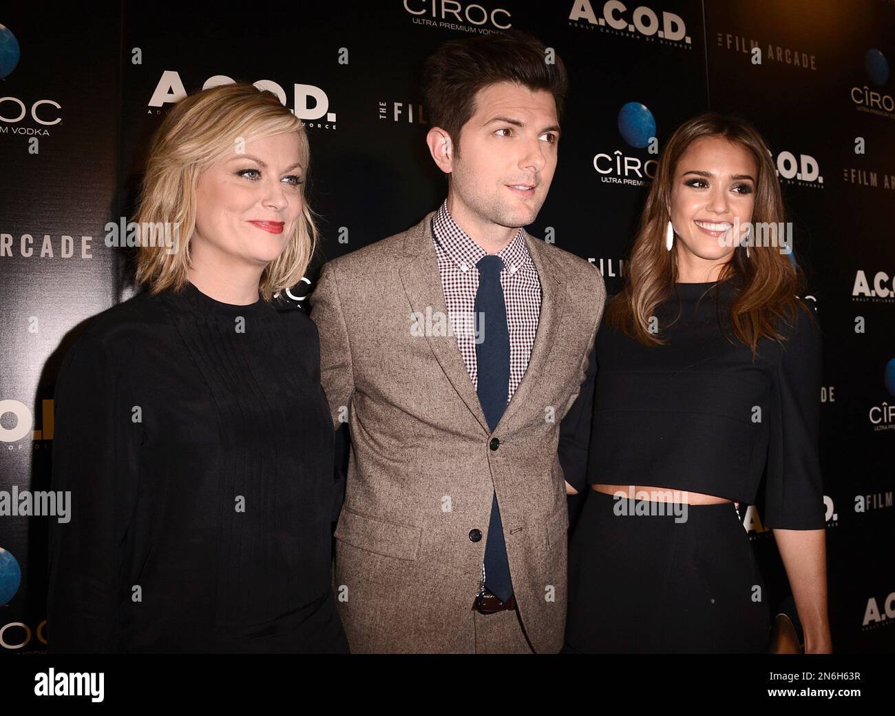 From left to right, actress Amy Poehler, actor Adam Scott, and actress ...