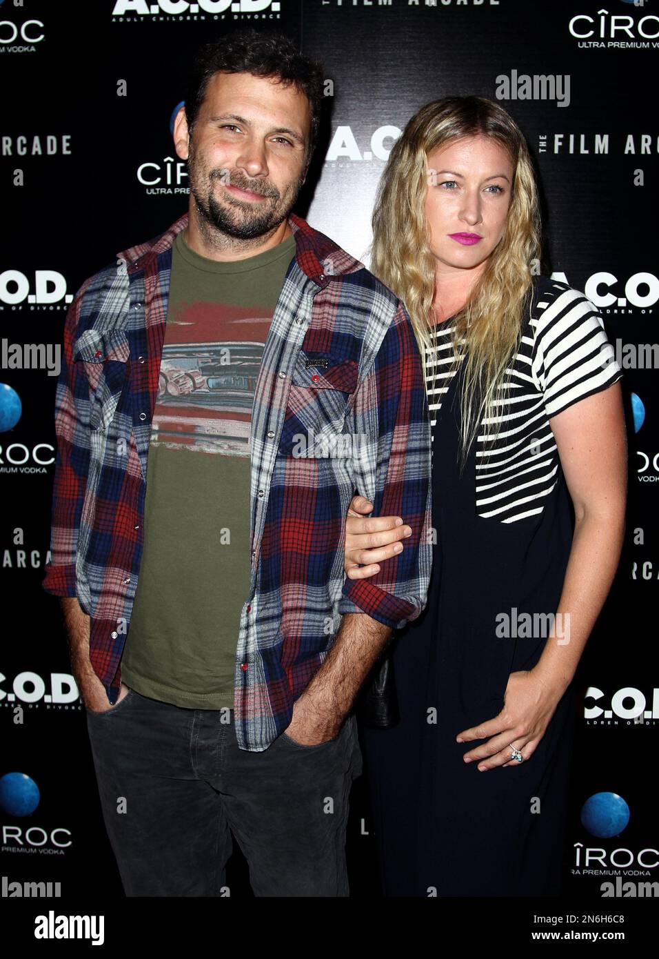 Jeremy Sisto, left, and Addie Lane arrive at the premiere of "A.C.O.D ...