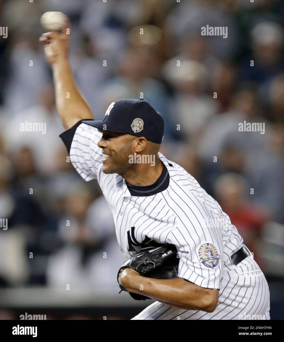 New York Yankees relief pitcher Mariano Rivera delivers against the ...