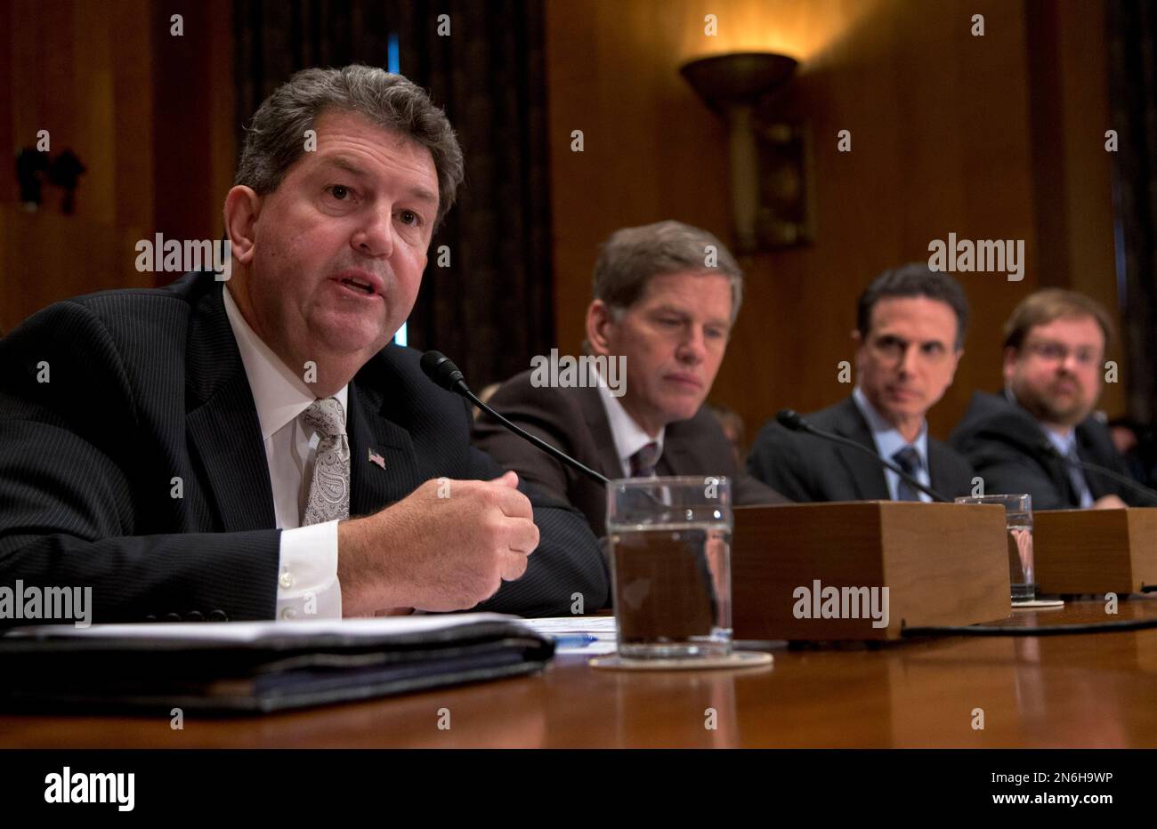 Postmaster General Patrick Donahoe, left, testifies on Capitol Hill in ...