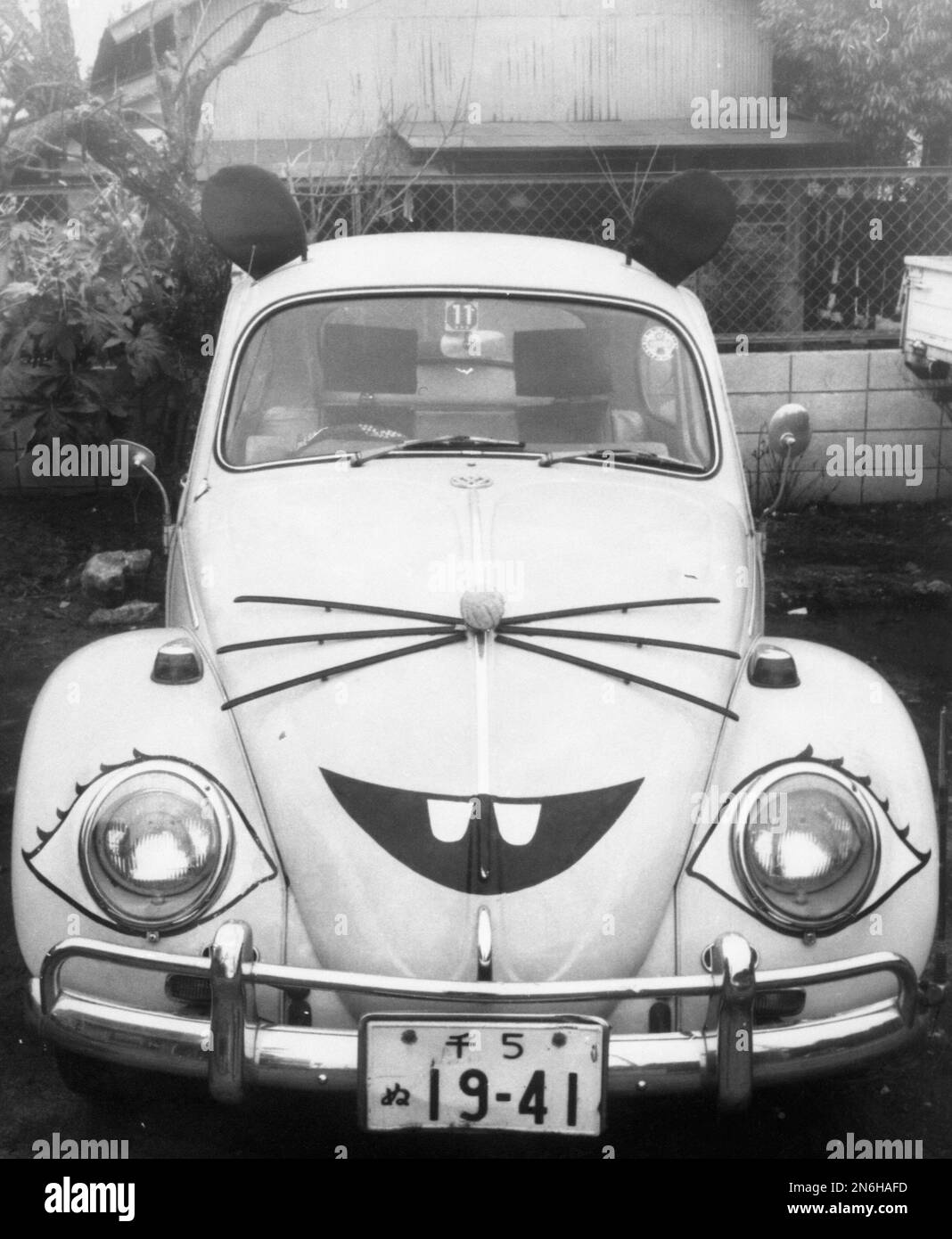 A Volkswagen Beetle with a mouse design which belongs to an ...