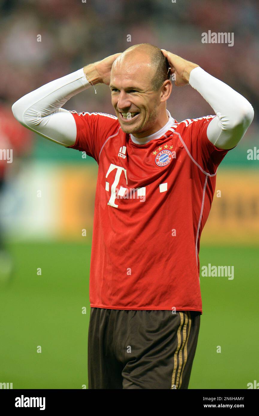 Munich`s Arjen Robben of the Netherlands reacts prior to the German ...