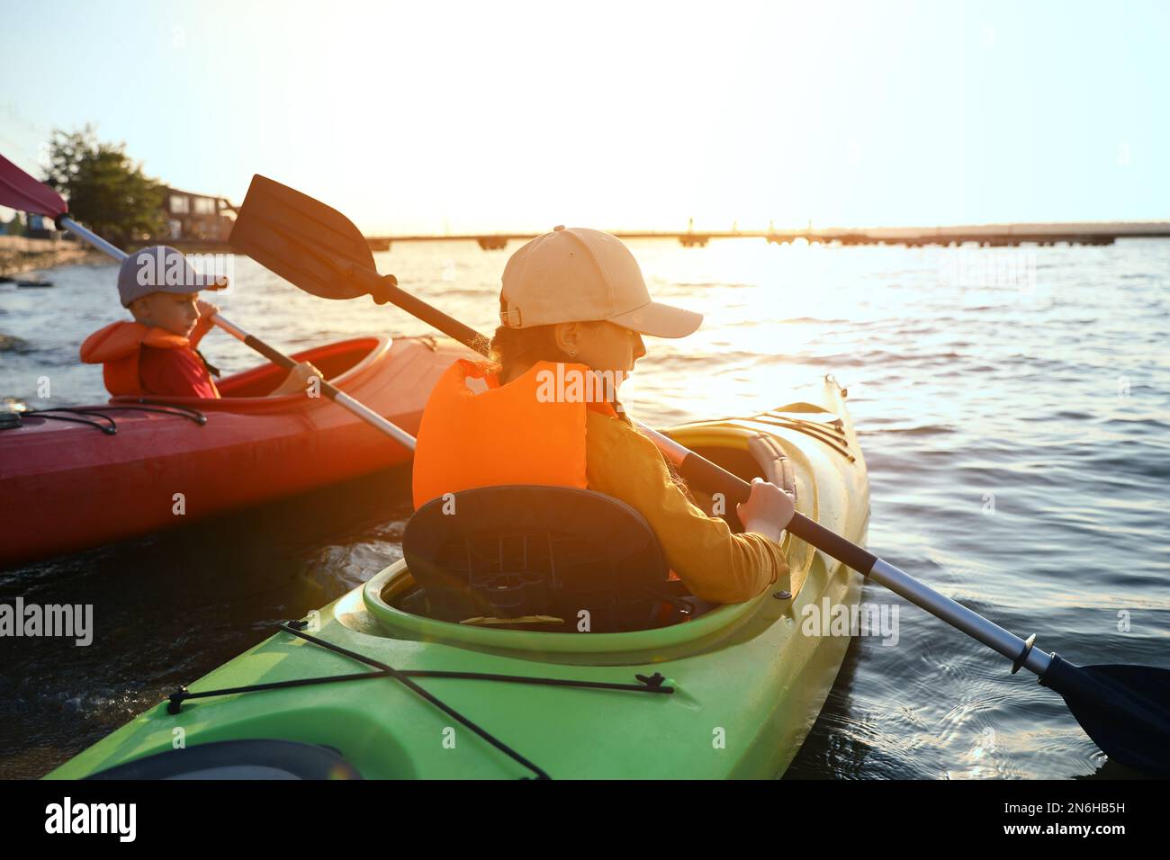 Little children kayaking on river. Summer camp activity Stock Photo - Alamy