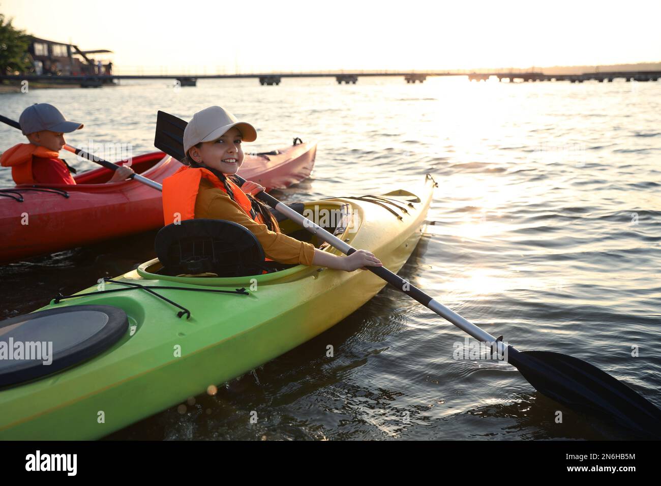 Little children kayaking on river. Summer camp activity Stock Photo - Alamy