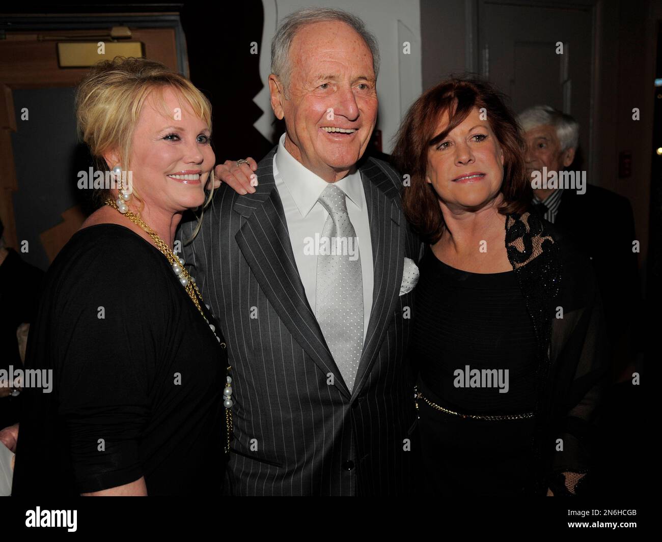 Producer Jerry Weintraub, center, poses with his wife Susan Ekins ...