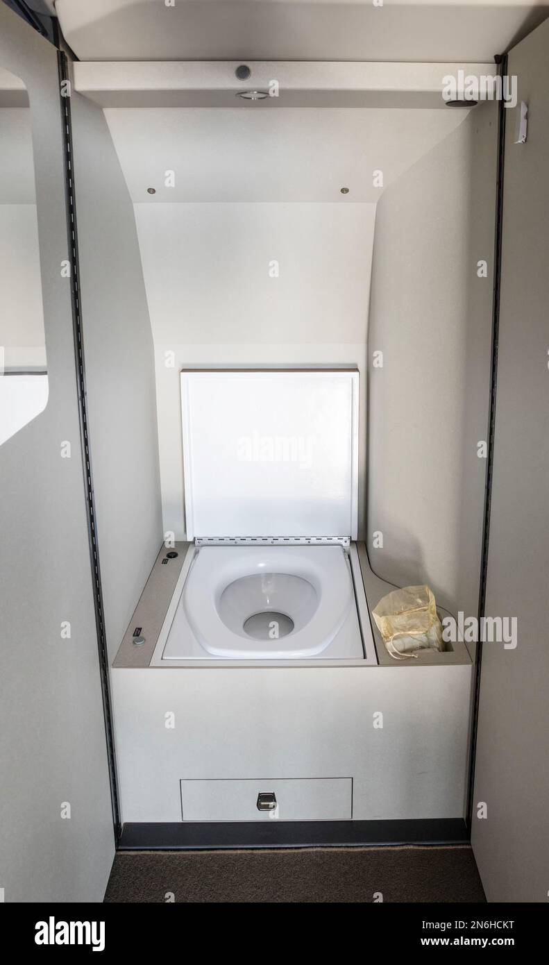 Interior of a modern business turboprop aircraft. Toilet in a small ...