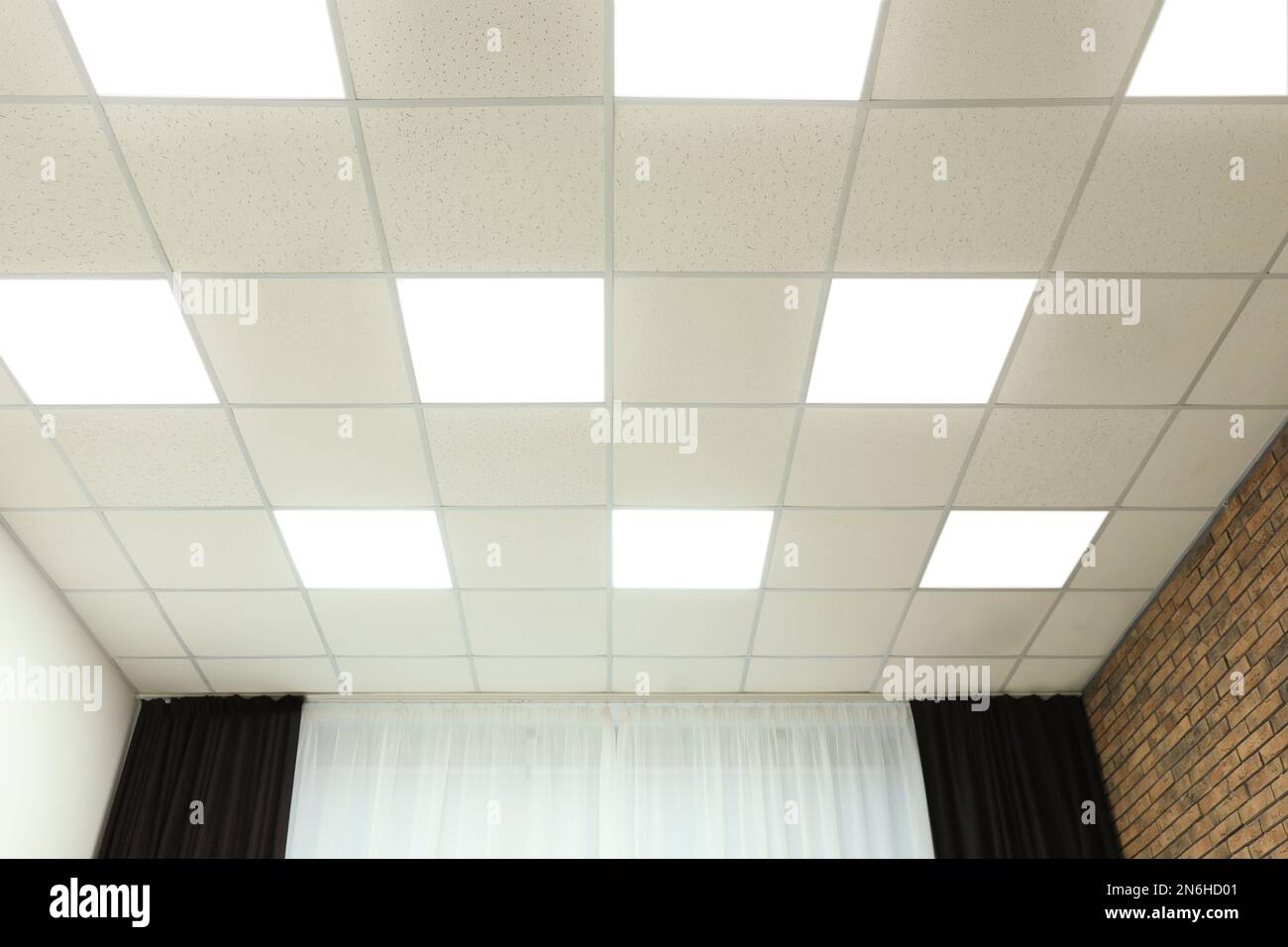 White ceiling with lighting in office room Stock Photo - Alamy