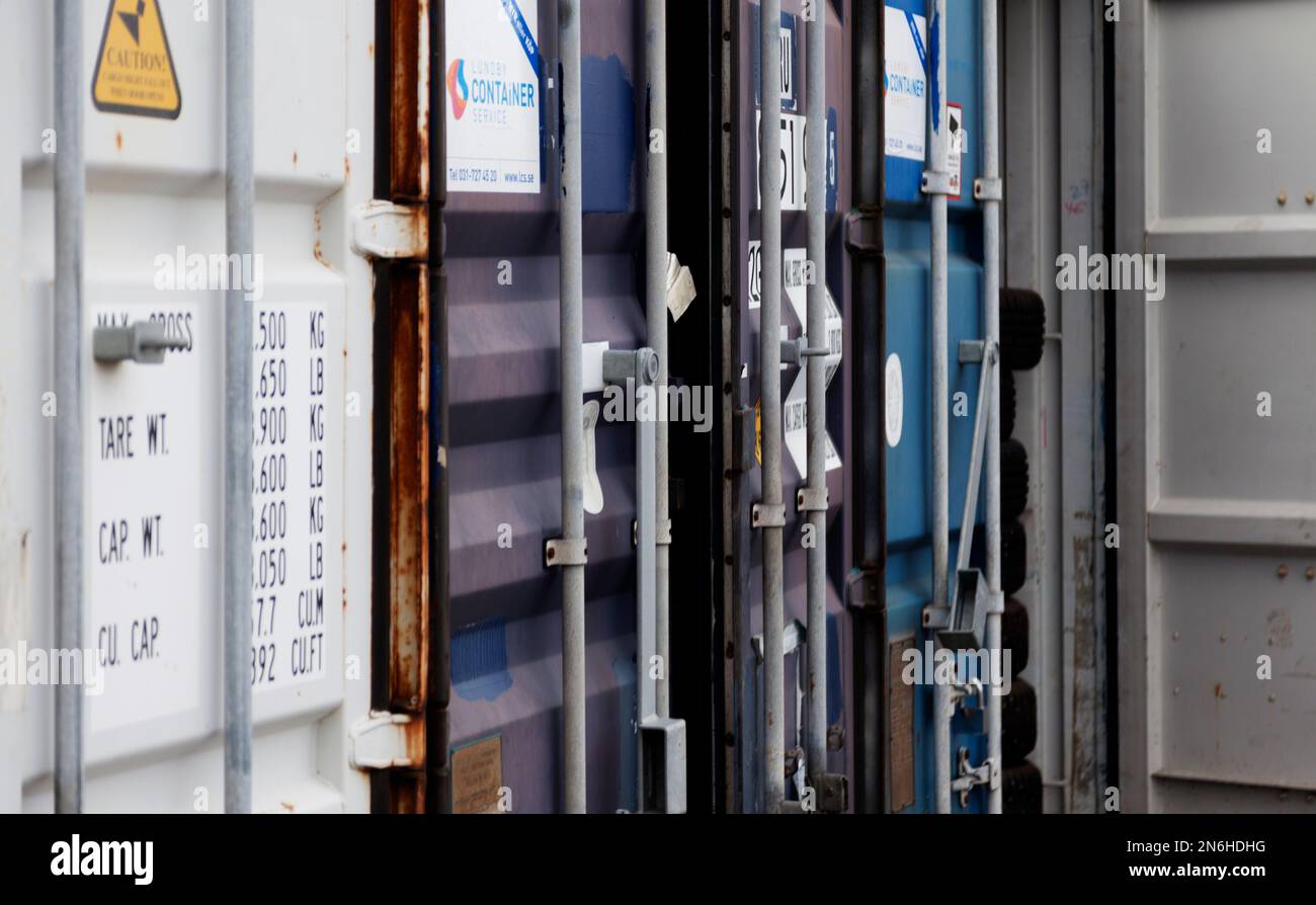 Row blue metal shipping containers hi-res stock photography and images ...